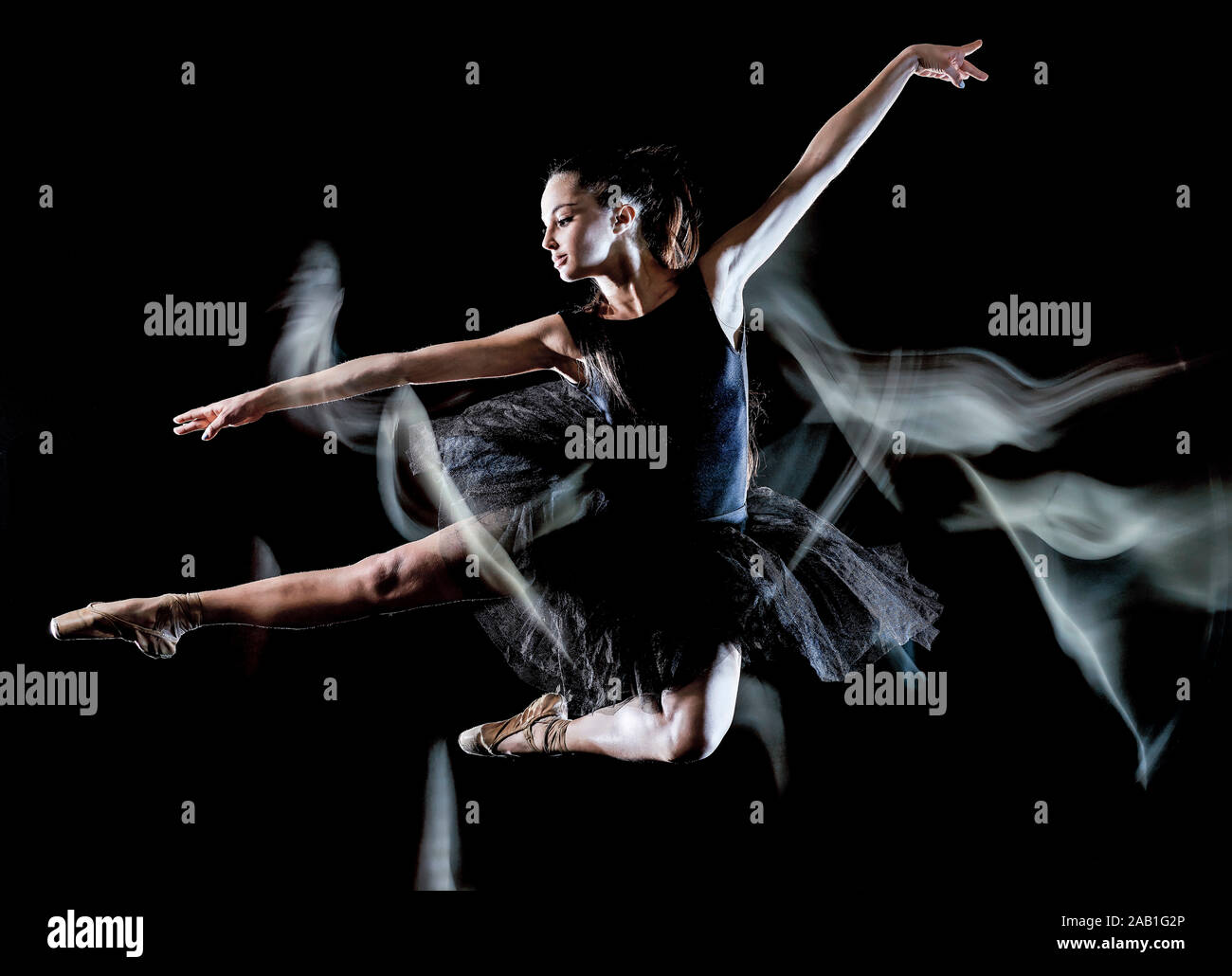 one caucasian young woman ballerina dancer dancing isolated on black ...