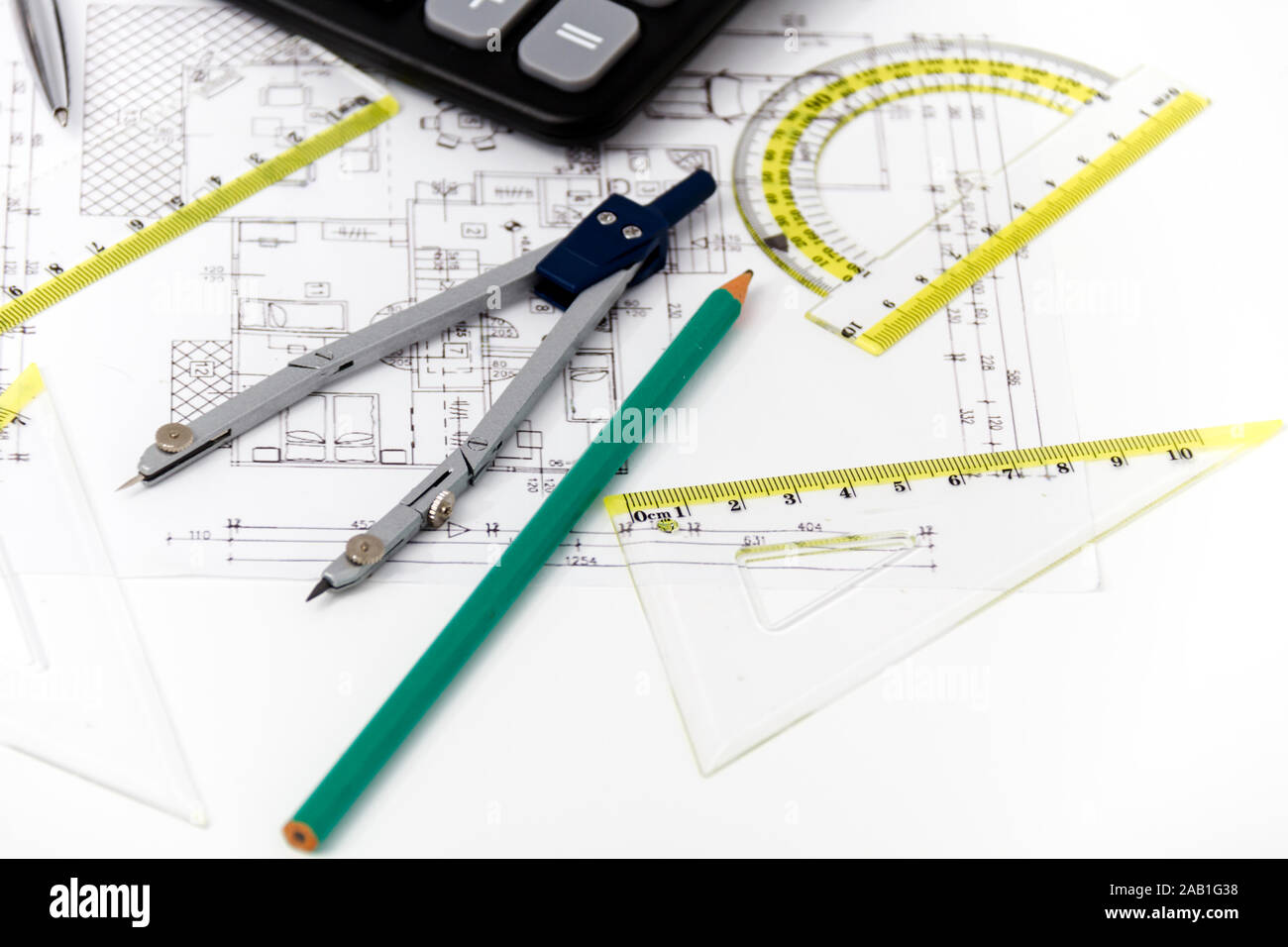 Photo of the Architectural project, pair of compasses, rulers and ...