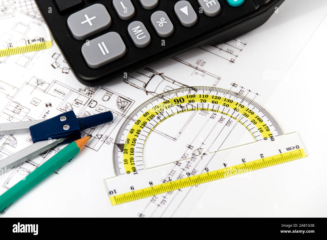Photo of the Architectural project, pair of compasses, rulers and ...