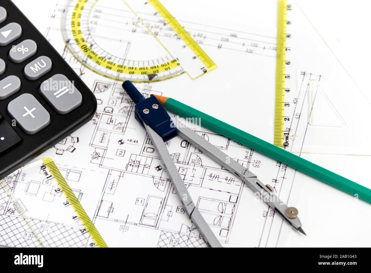 Photo of the Architectural project, pair of compasses, rulers and ...