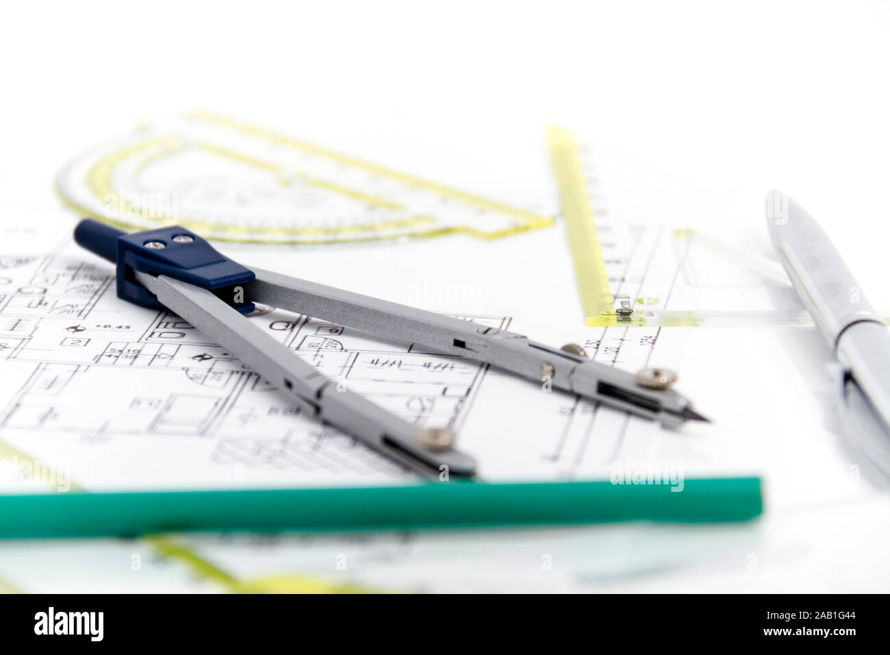 Photo of the Architectural project, pair of compasses, rulers and calculator Stock Photo - Alamy