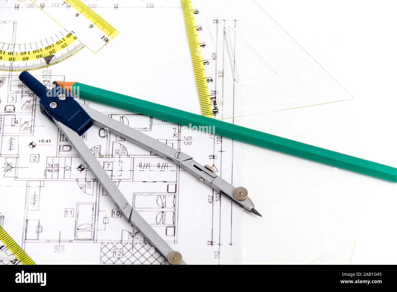 Photo of the Architectural project, pair of compasses, rulers and ...