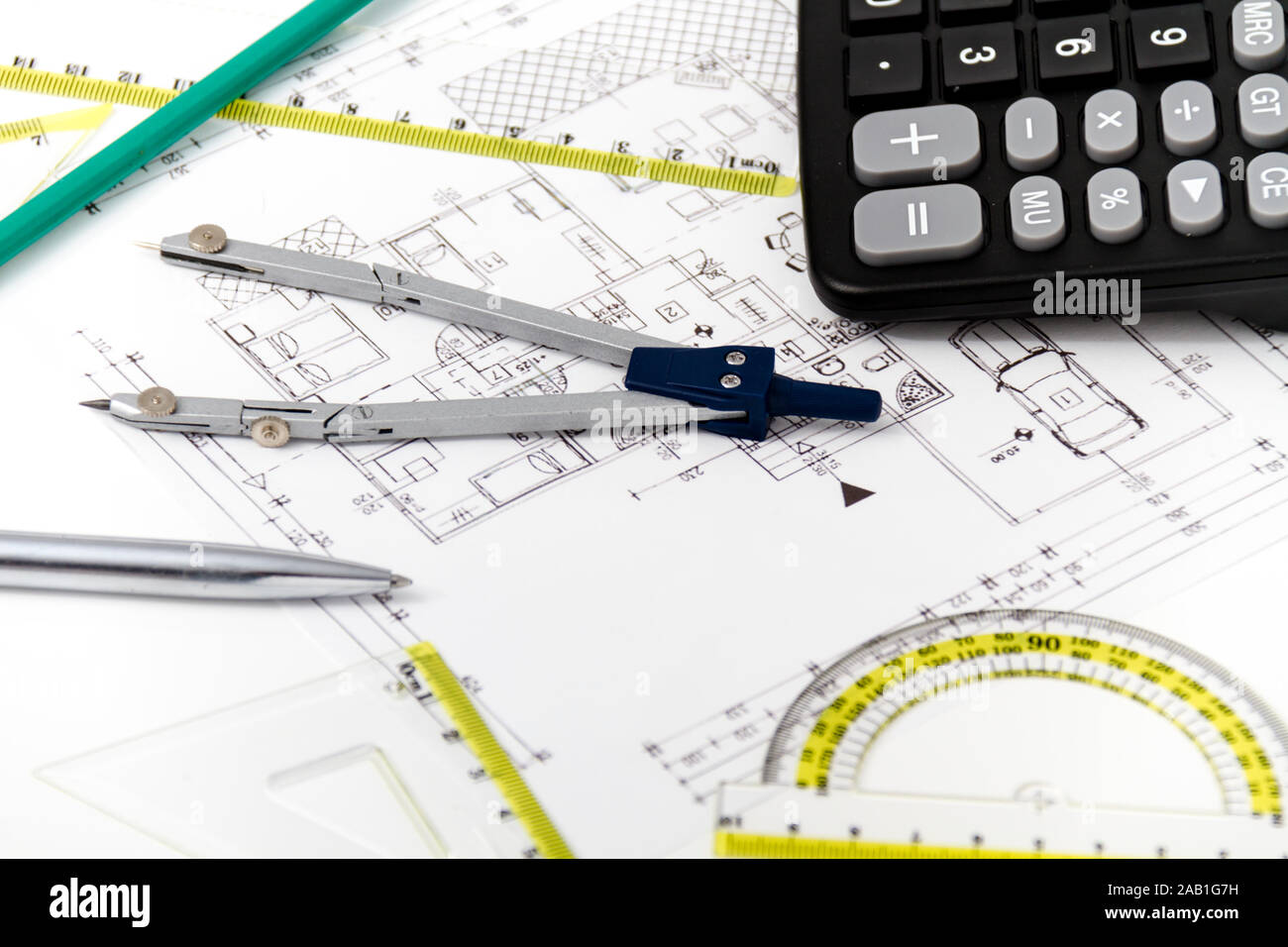 Photo of the Architectural project, pair of compasses, rulers and ...