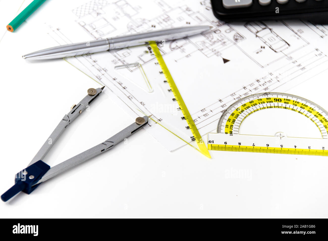 Photo of the Architectural project, pair of compasses, rulers and ...