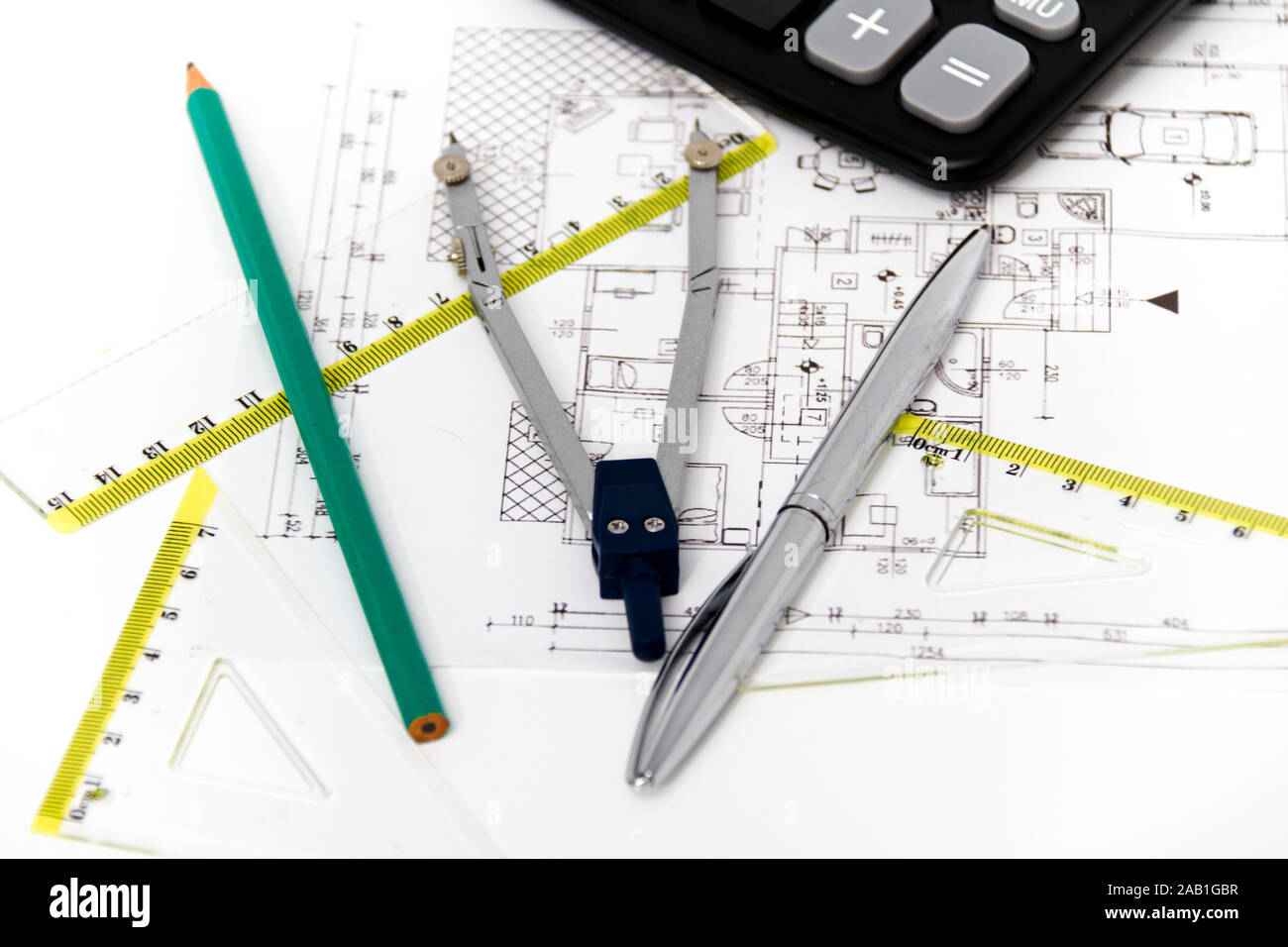 Photo of the Architectural project, pair of compasses, rulers and ...