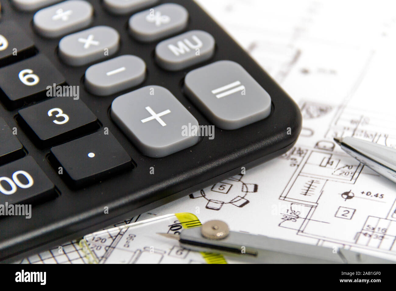 Photo of the Architectural project, pair of compasses, rulers and ...