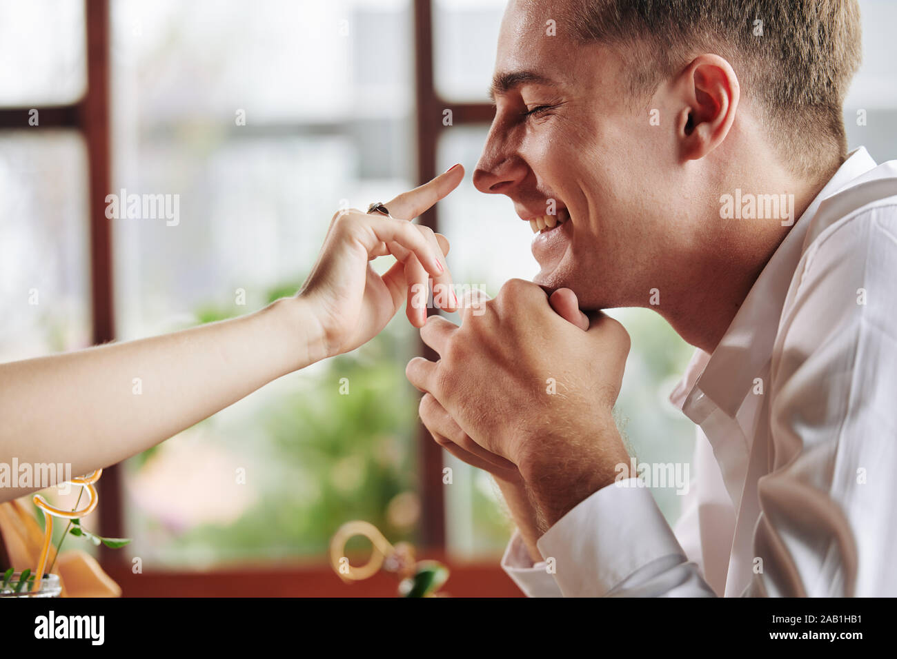 Pointing at nose hi-res stock photography and images - Alamy