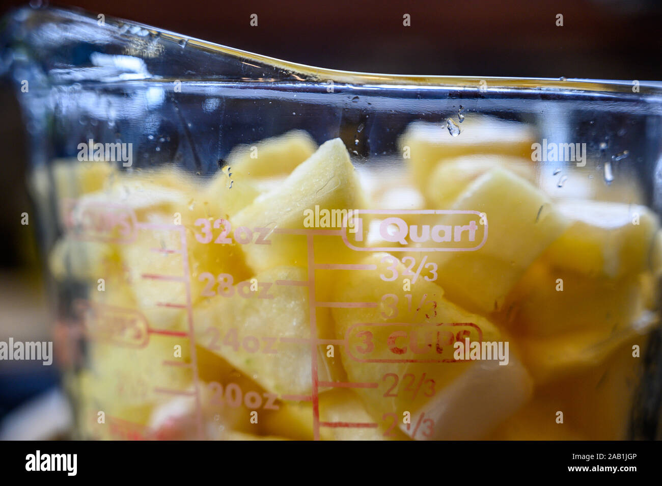 Close view of glass container with apples visible Stock Photo - Alamy