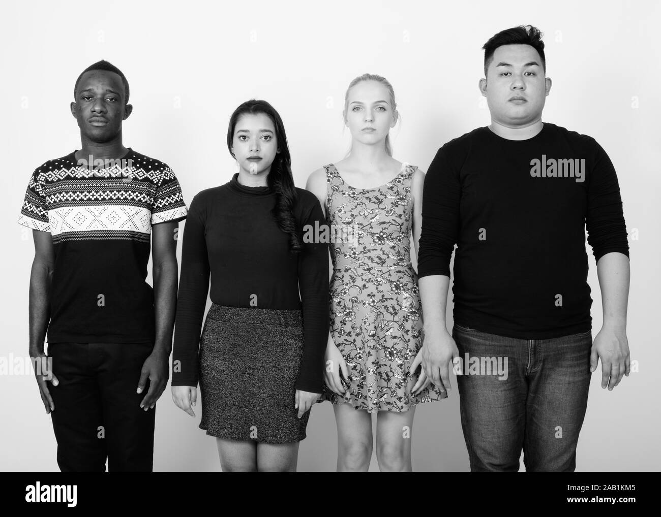 Group people standing studio shot Black and White Stock Photos & Images ...