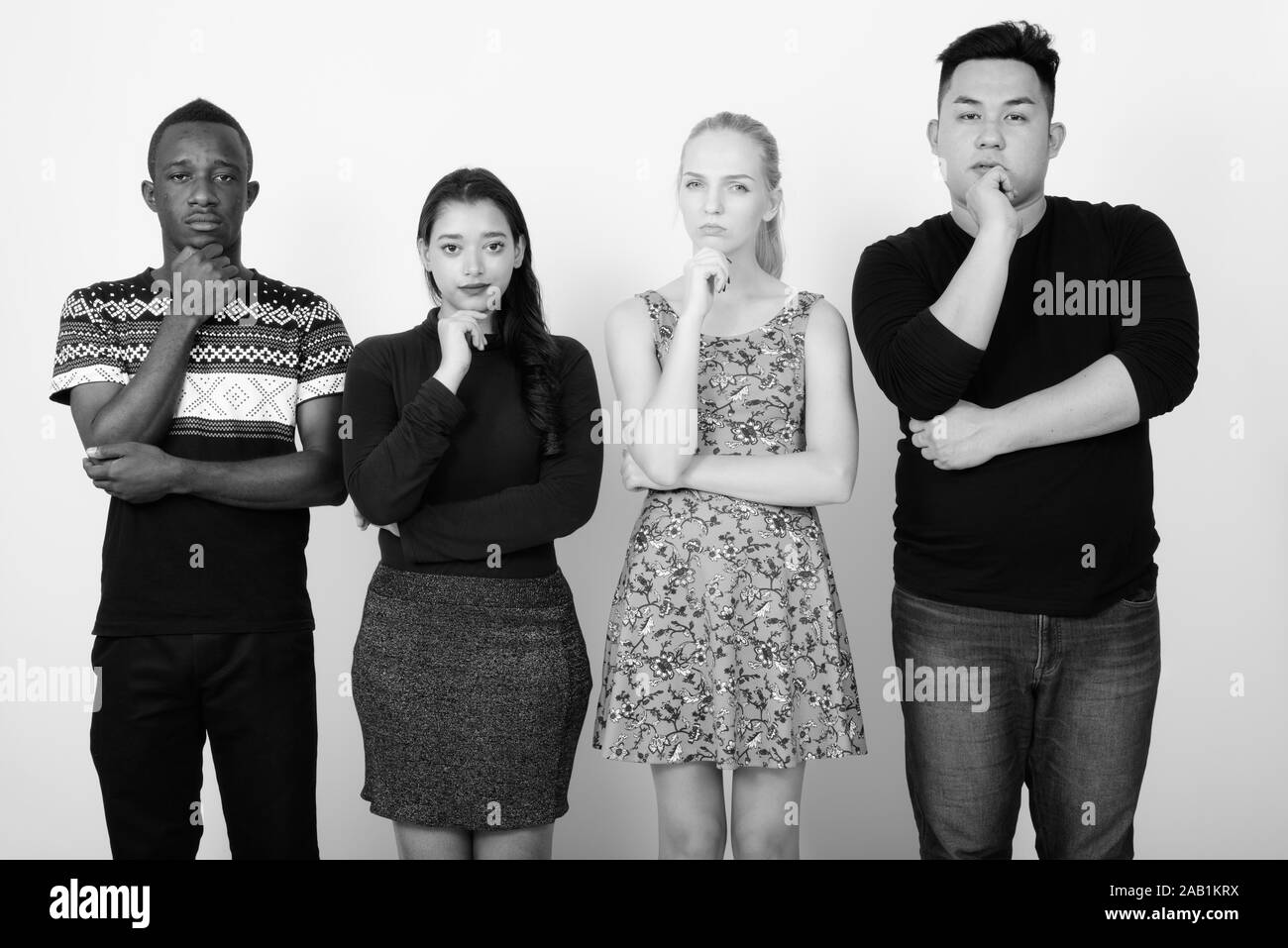 Group pensive young multiethnic Black and White Stock Photos & Images ...