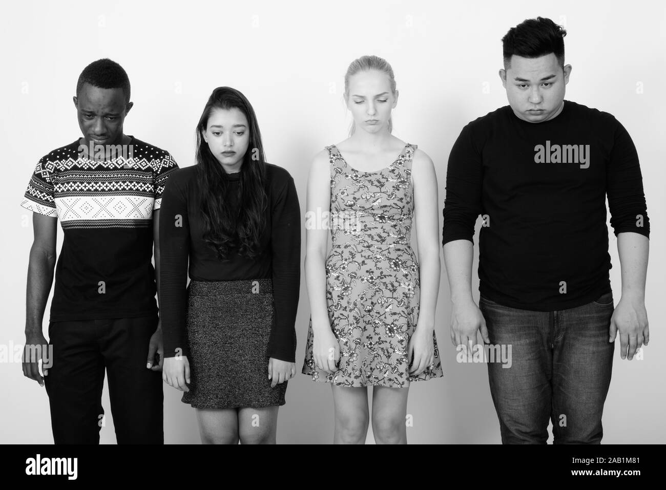 Group people sad hi-res stock photography and images - Alamy