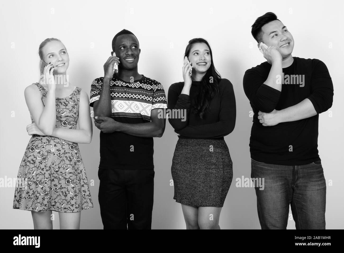 Studio shot of happy diverse group of multi ethnic friends smiling and ...