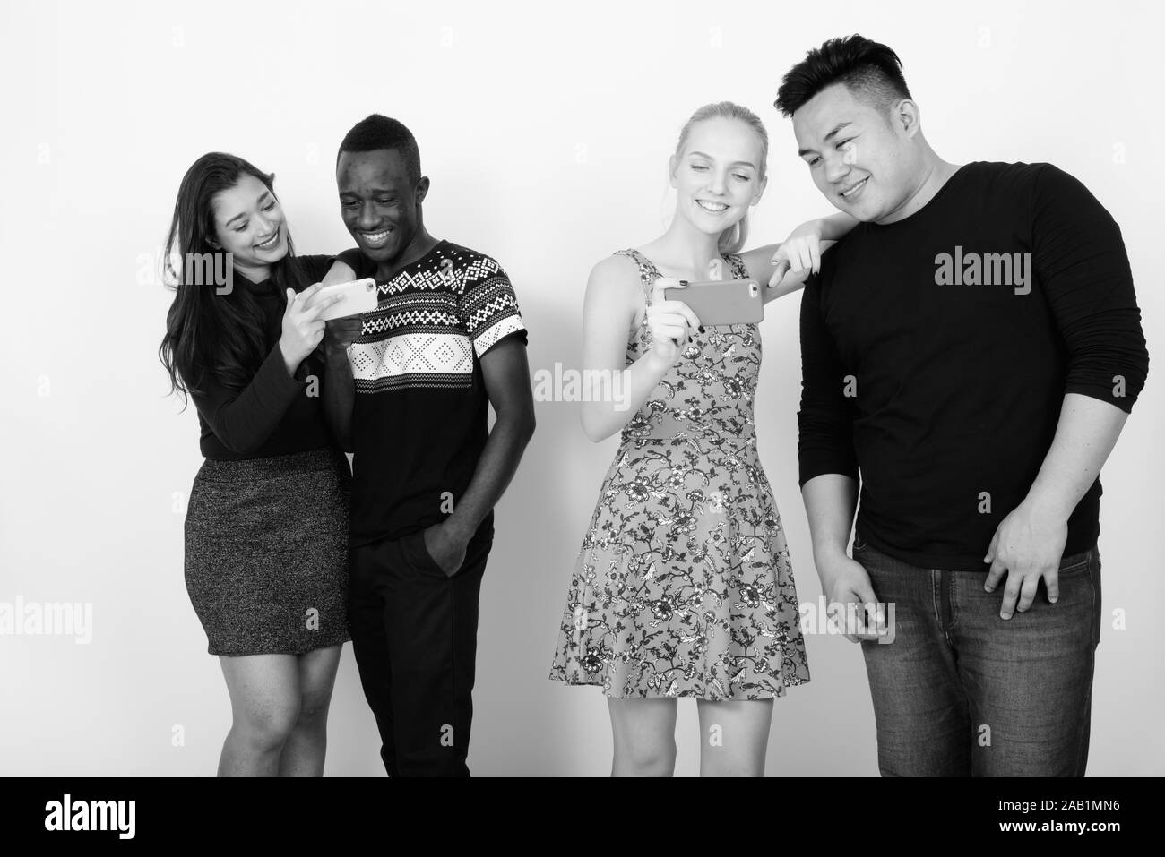 Group four multiethnic diverse Black and White Stock Photos & Images ...