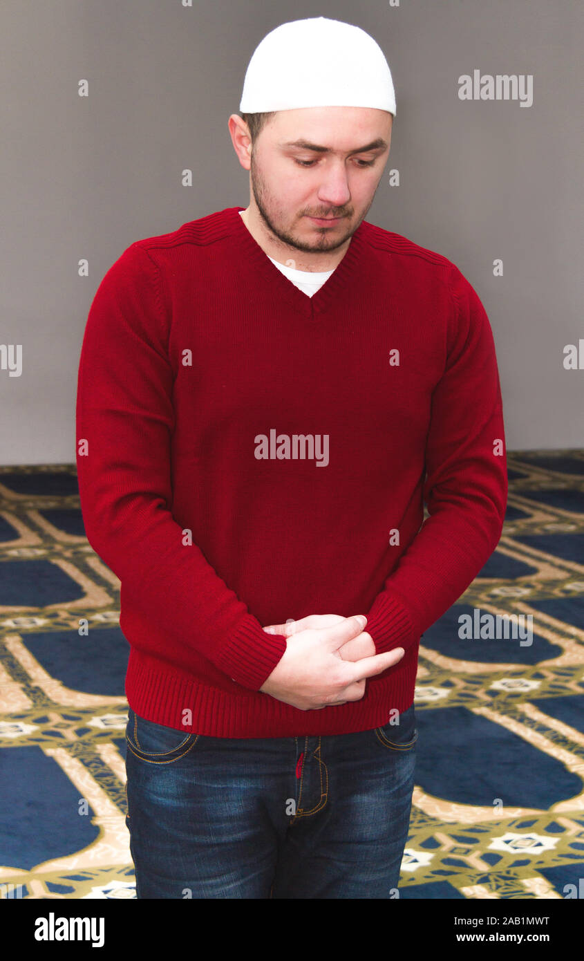 Photo of the Young muslim man showing Islamic prayer Stock Photo - Alamy