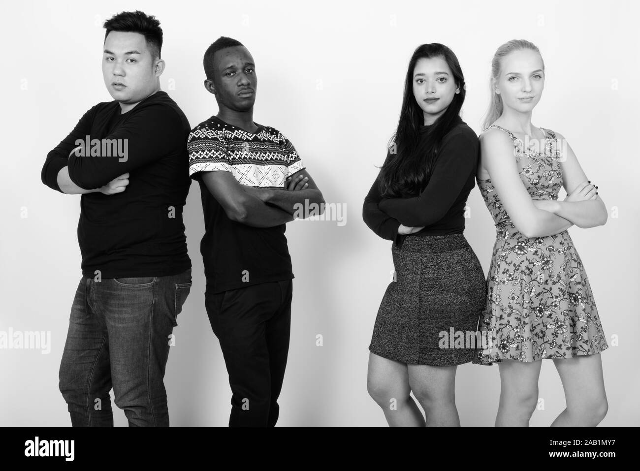 Diverse group friends arms Black and White Stock Photos & Images - Alamy