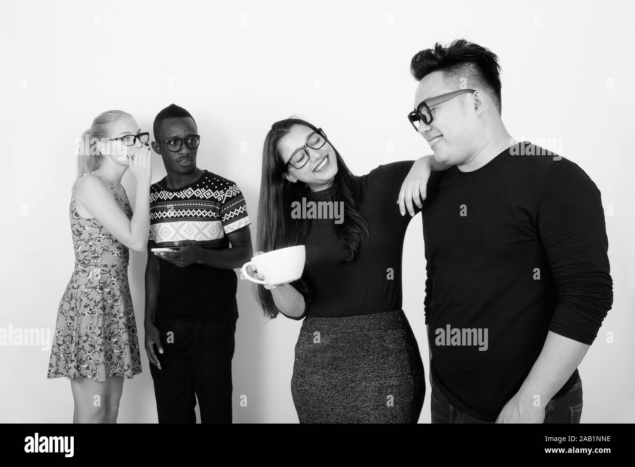 Indian young woman whispering Black and White Stock Photos & Images - Alamy