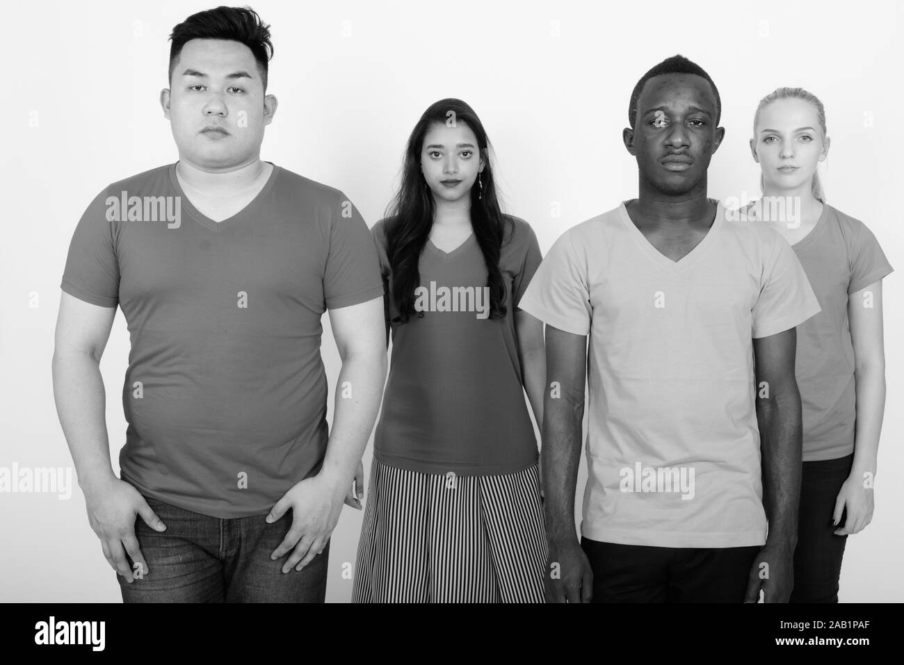 Young diverse group four friends Black and White Stock Photos & Images ...