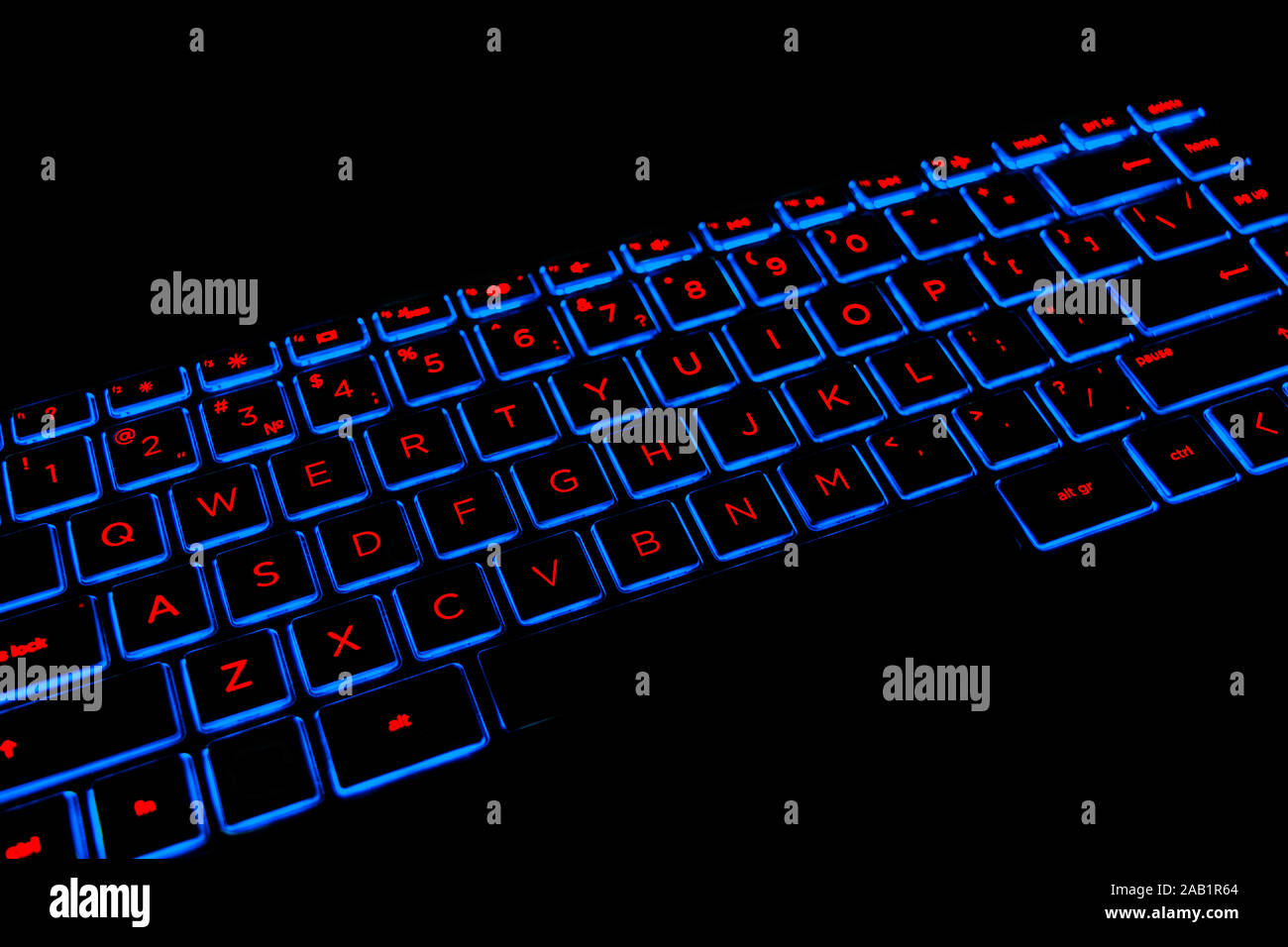 Close up view of a modern laptop computer keyboard keys. Soft lightning ...