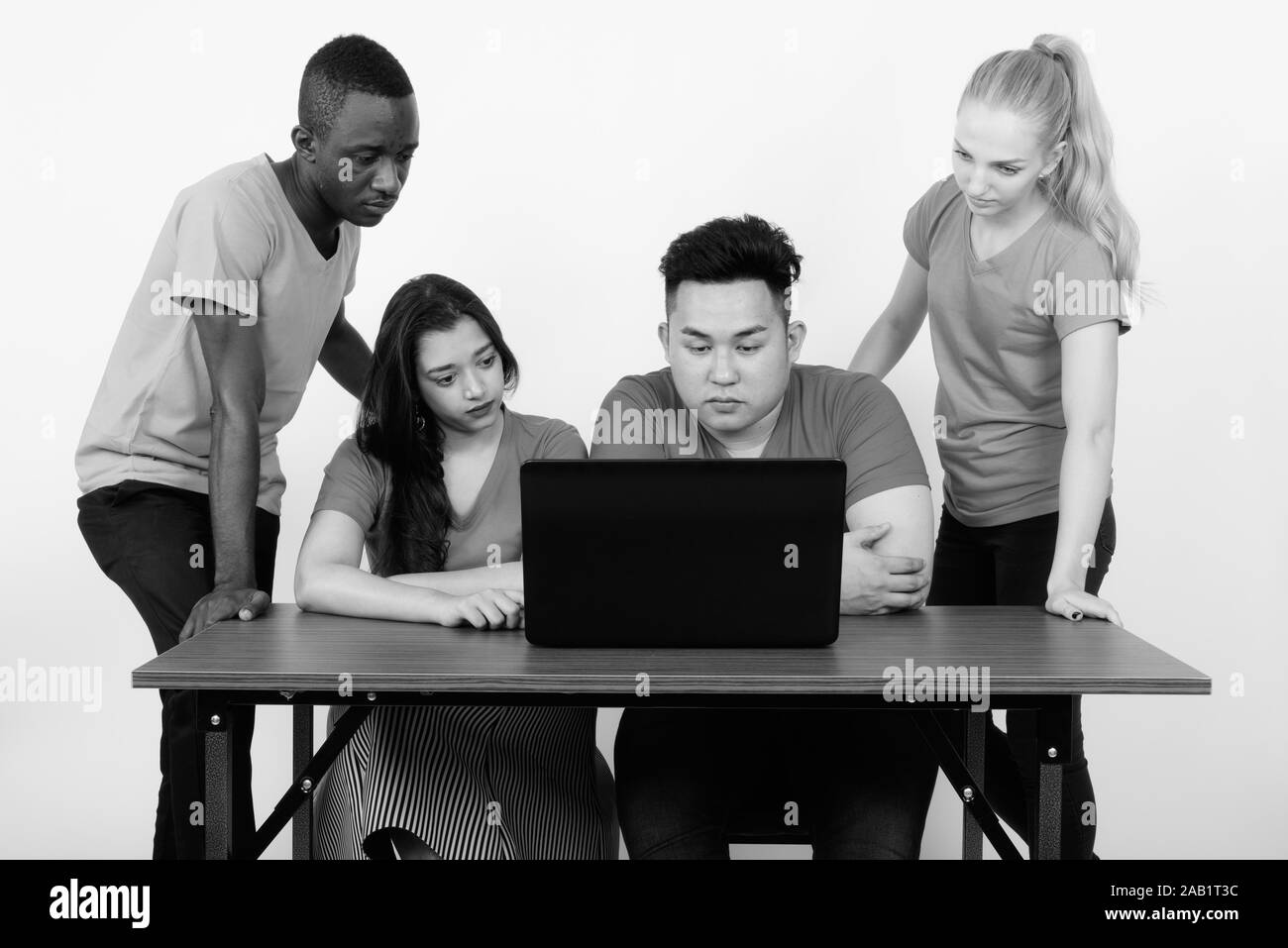 Group young people laptop Black and White Stock Photos & Images - Alamy