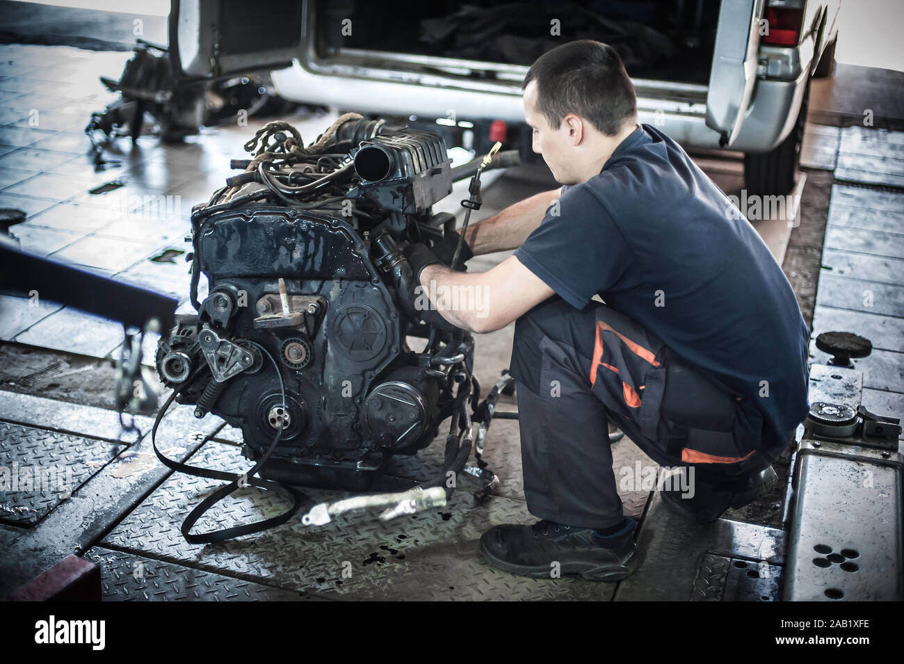 Removed engine from car. Car master auto mechanic repairer chacking and ...