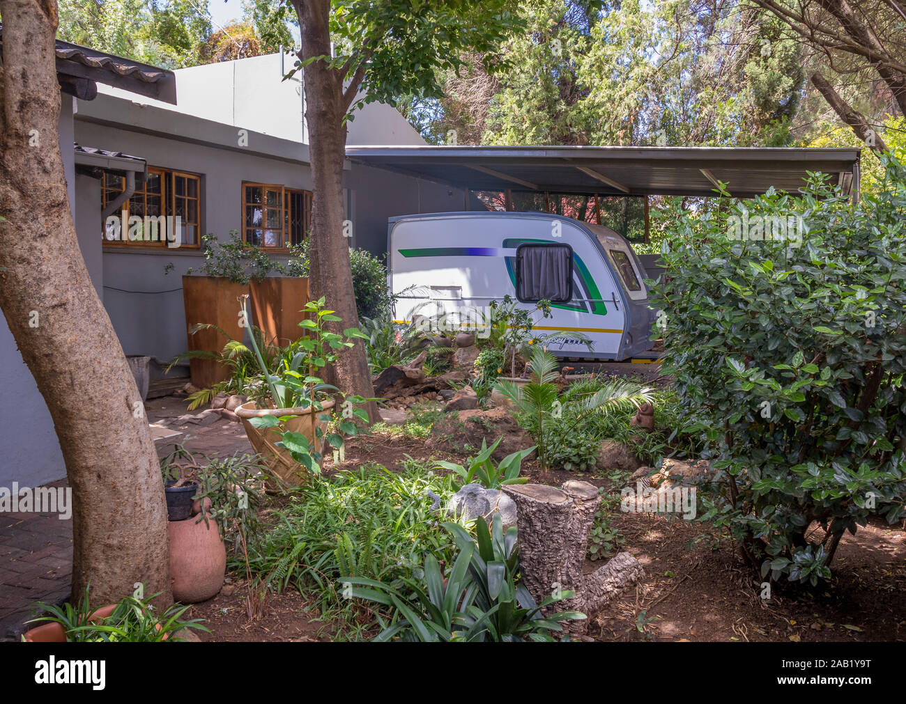 Alberton, South Africa - a small caravan parked under roof in a ...