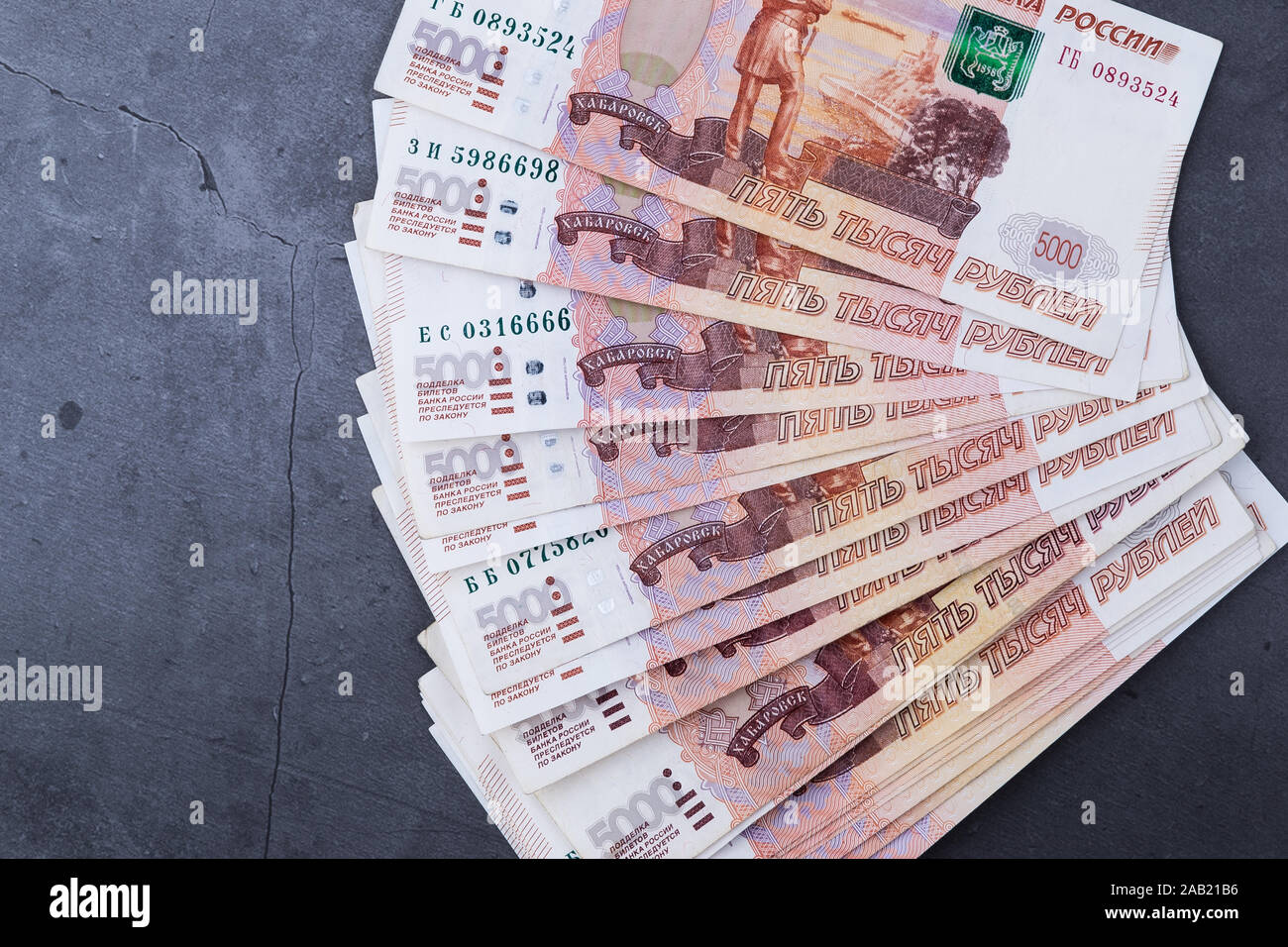 Big stack of Russian money banknotes of five thousand rubles lying fan ...