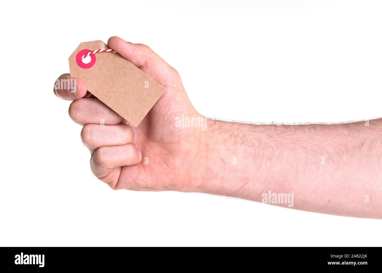 Paper tag and hand, isolated on white Stock Photo - Alamy