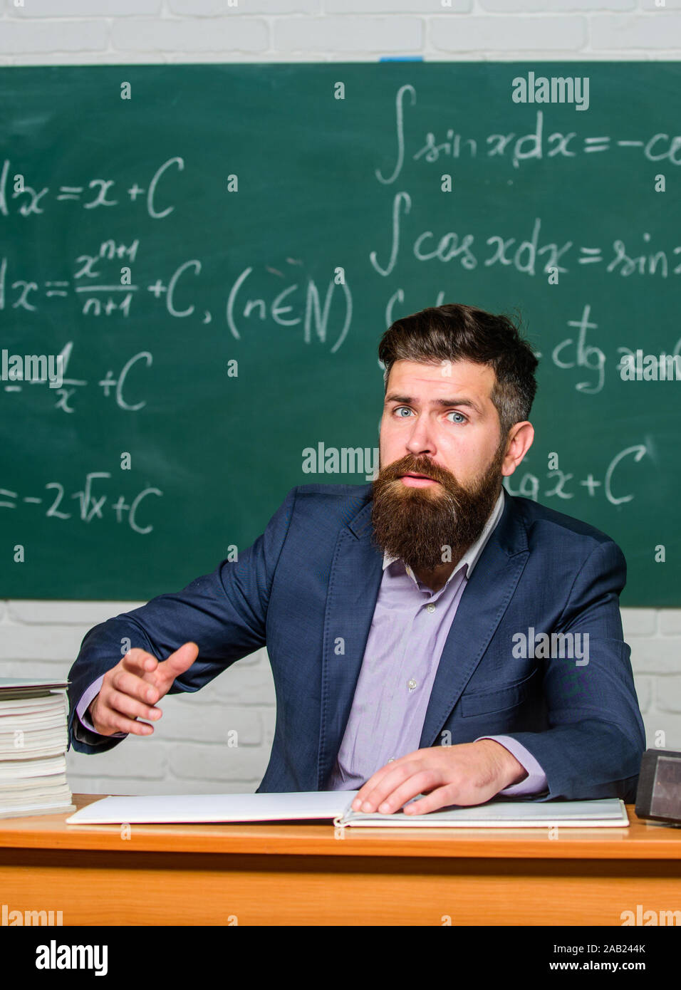 Demanding teacher. Get out of class. Teacher strict serious bearded man ...
