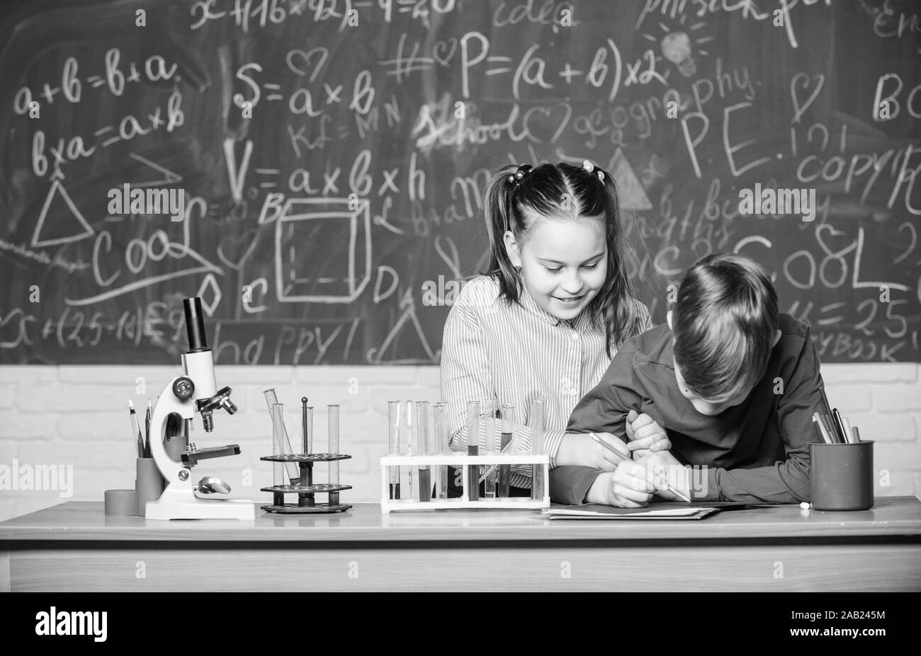 Chemistry science. biology experiments with microscope. Little kids ...