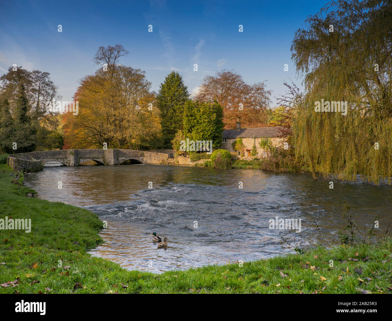 The Sheepwash Bridge over the River Wye at Ashford in the Water ...
