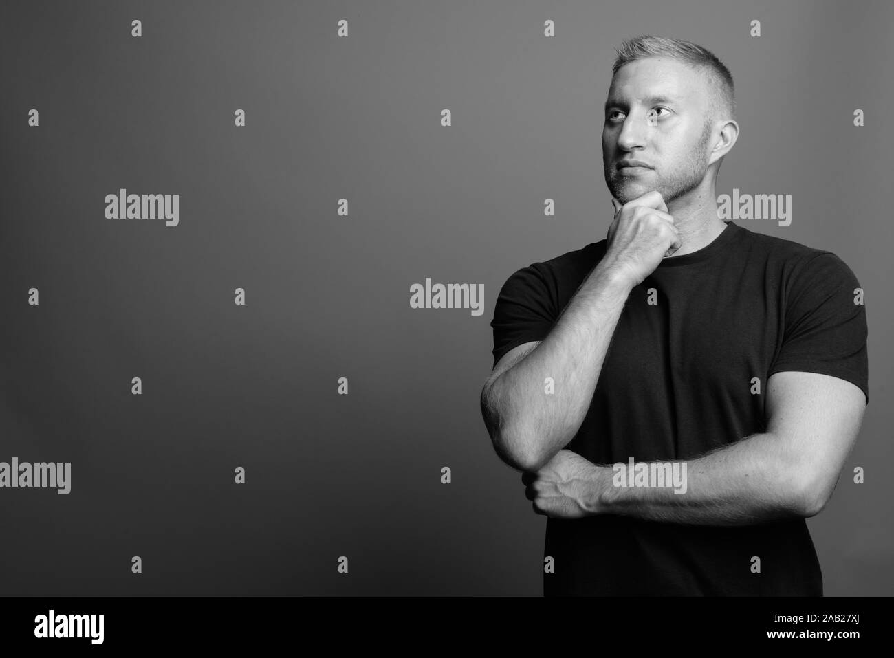 Muscular guy in white Black and White Stock Photos & Images - Alamy