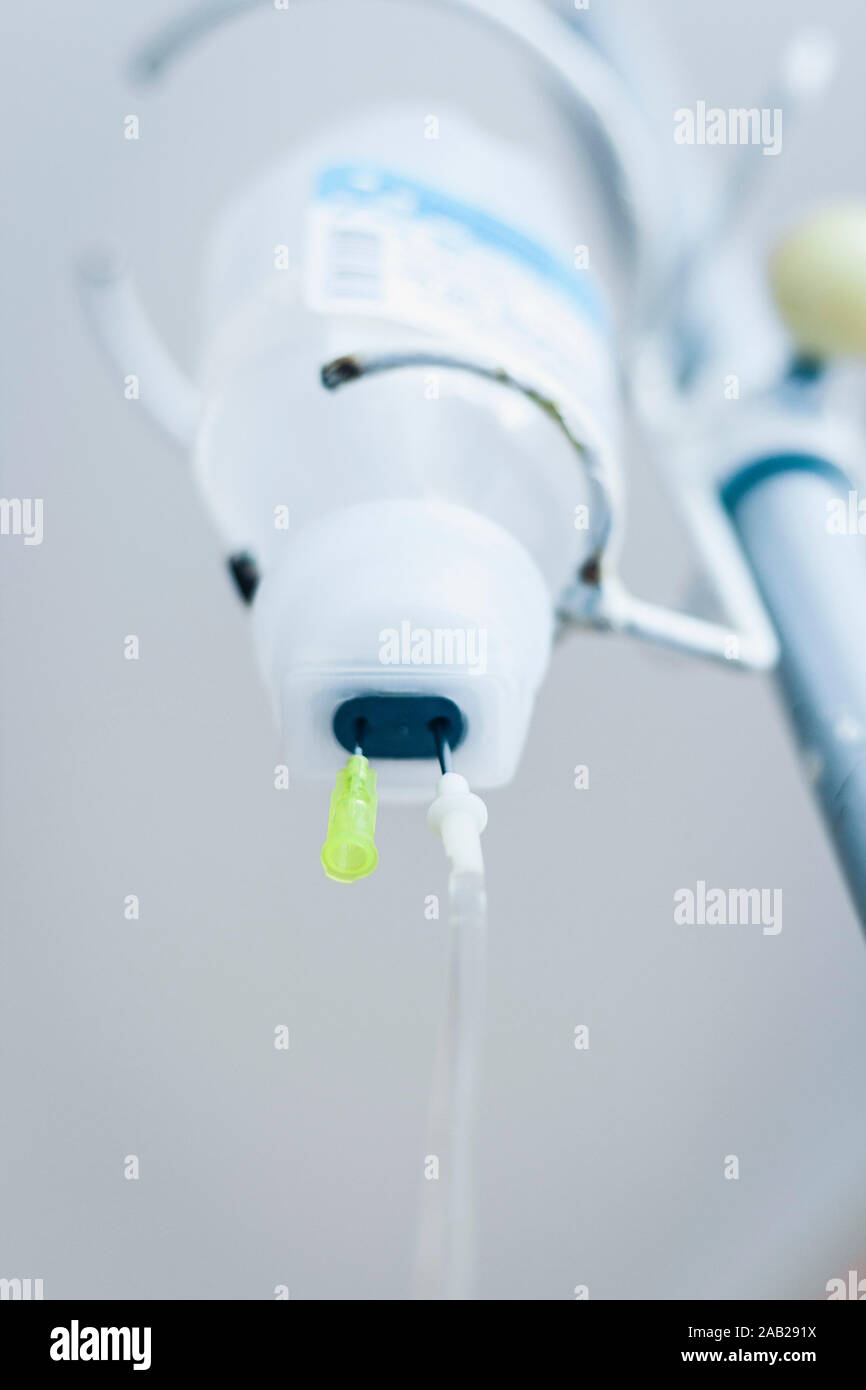 Close-up bottle of medicine on dropper system in the operating room ...