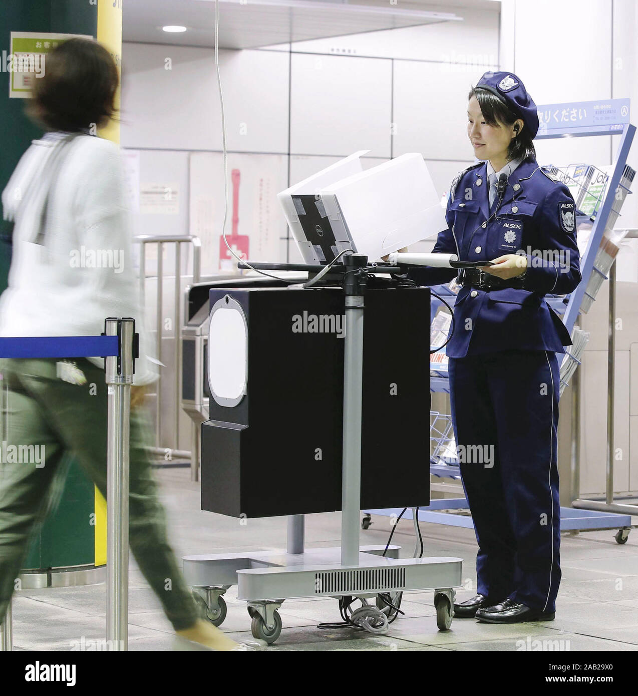 A body scanner that can detect electromagnetic waves is set up at a ...