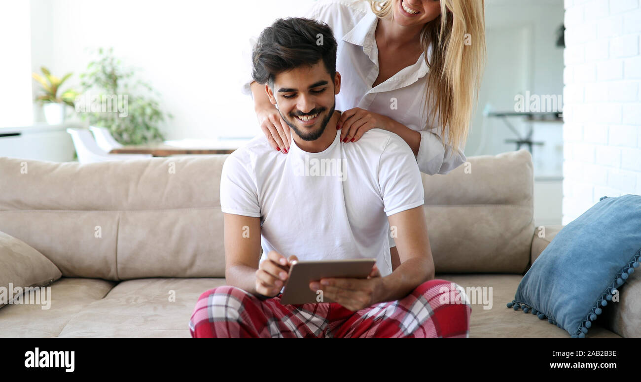 Woman giving massage to her boyfriend Stock Photo - Alamy