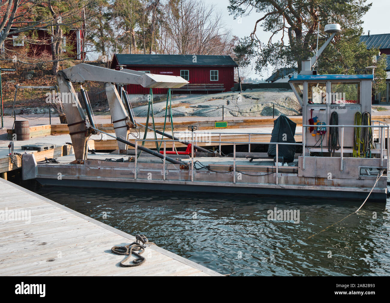 Metal flat-bottomed boat with hydraulic winch, Fjaderholmarna island ...