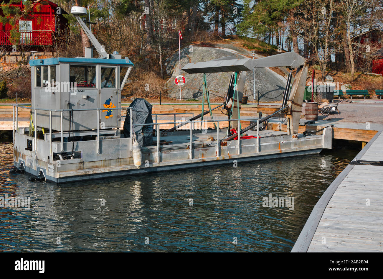 Metal flat-bottomed boat with hydraulic winch, Fjaderholmarna island ...