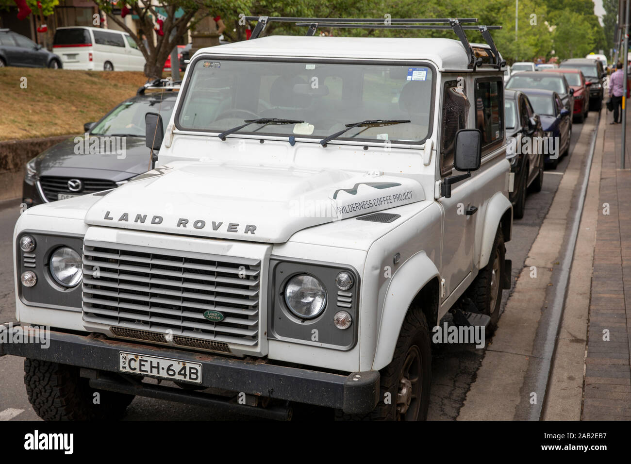 White land rover defender vehicle parked in Leura in the blue mountains ...