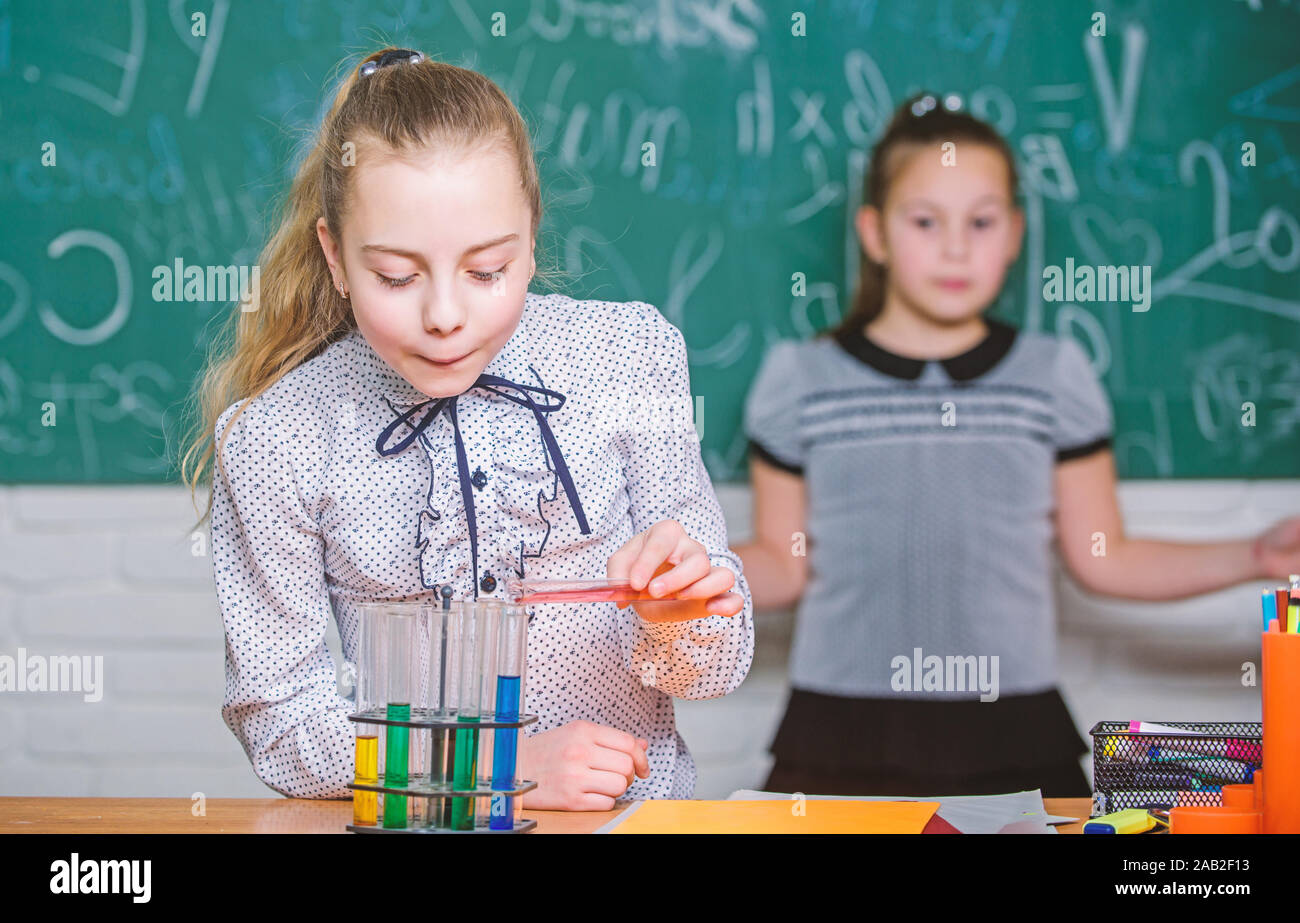 science experiments in laboratory. Chemistry research. Children using ...