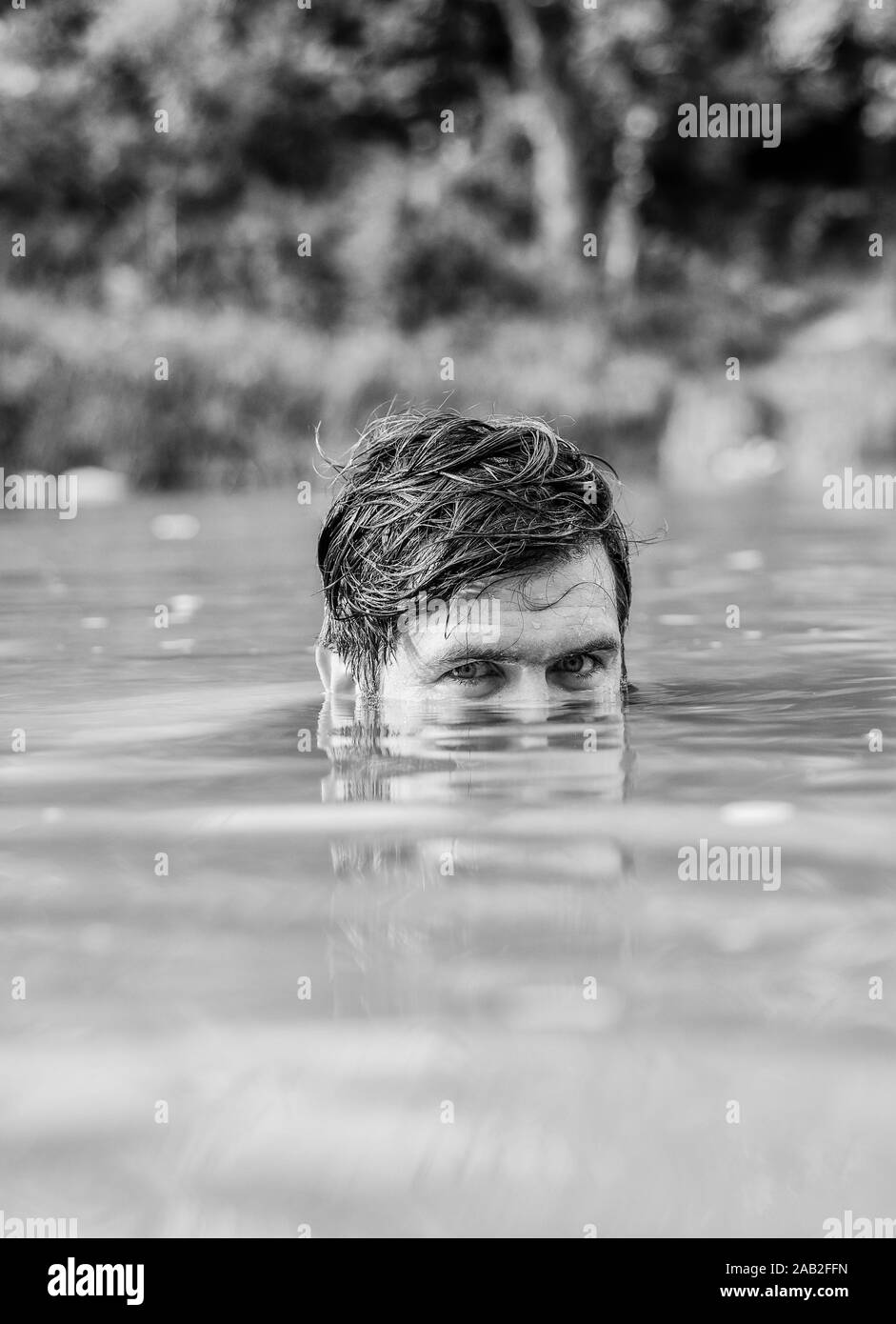 Summer activity. Swimming sport. Freshness of wild nature. Summer ...