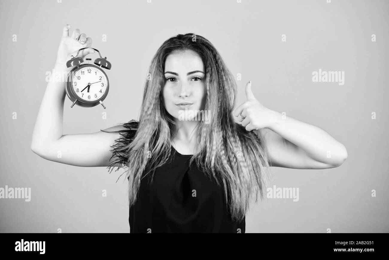 Time to work. time zone. punctuality and discipline. girl hold alarm ...