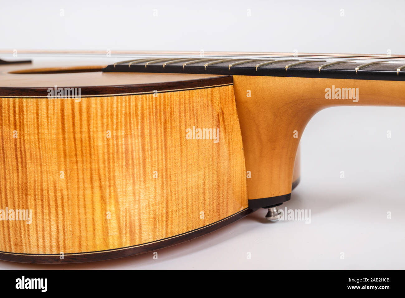 wood texture of lower deck of six strings acoustic guitar on white ...