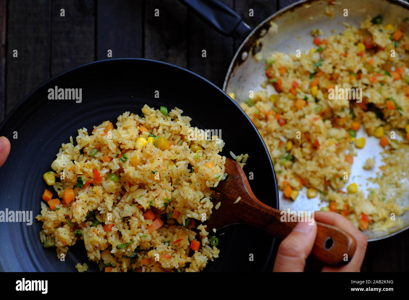 Top view black plate of Vietnamese food, fried rice with colorful ...