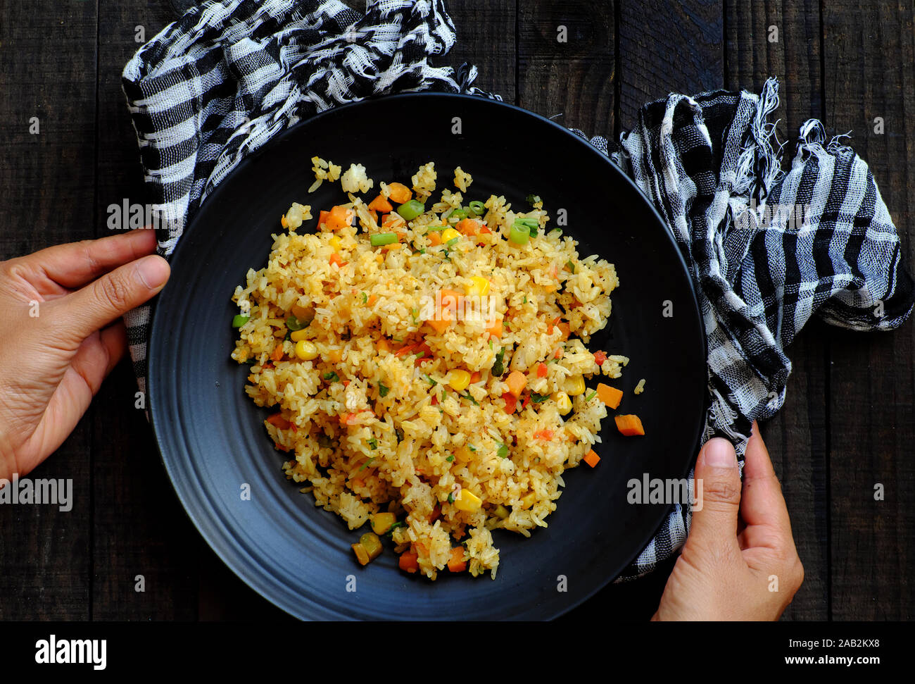 Top view black plate of Vietnamese food, fried rice with colorful ...