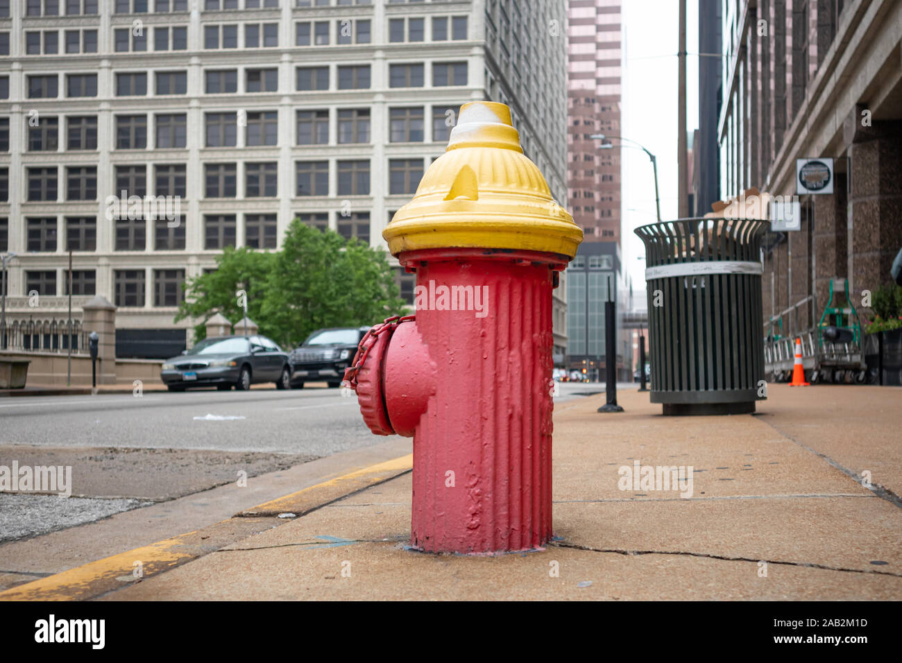 Fire hydrant red color in the city center, cloudy spring day. Saint ...