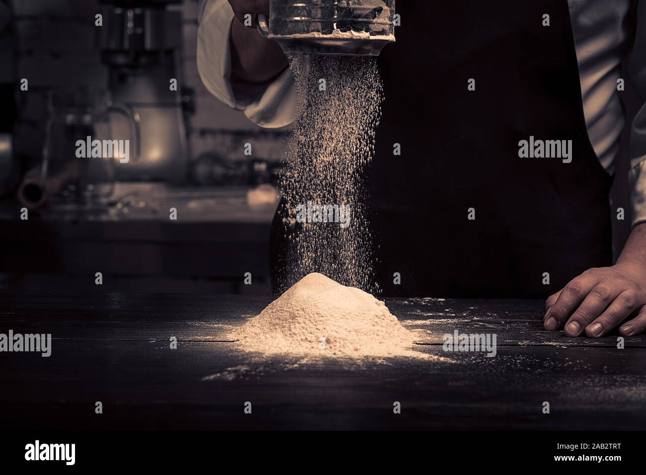 Chef hands dropping flour hi-res stock photography and images - Alamy