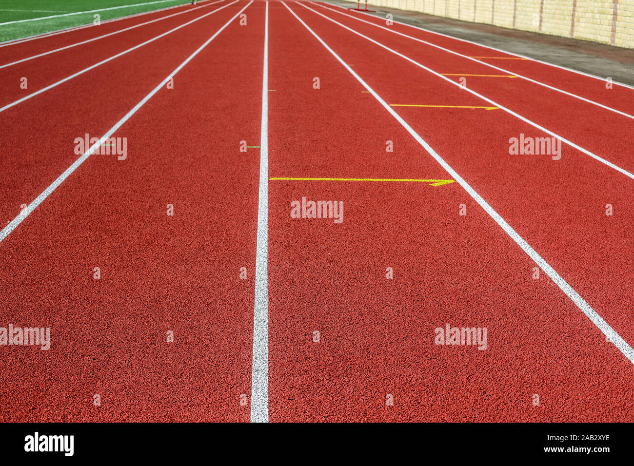 Red treadmill in sport field Stock Photo - Alamy