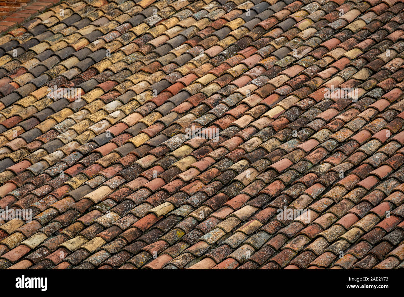 Colorful tile roof with tiles in different tones Stock Photo - Alamy