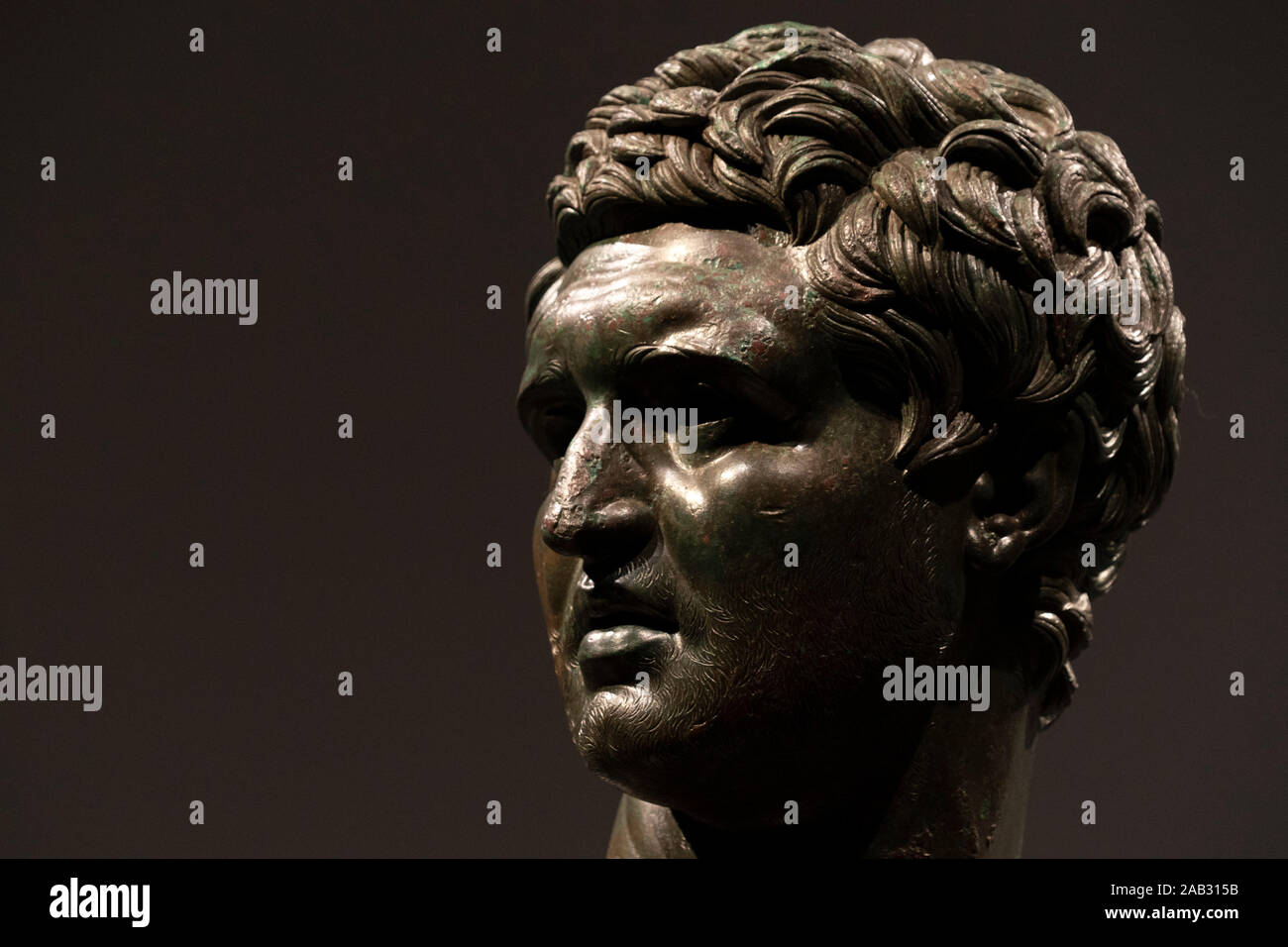 ancient roman head marble sculpture isolated on black background Stock ...