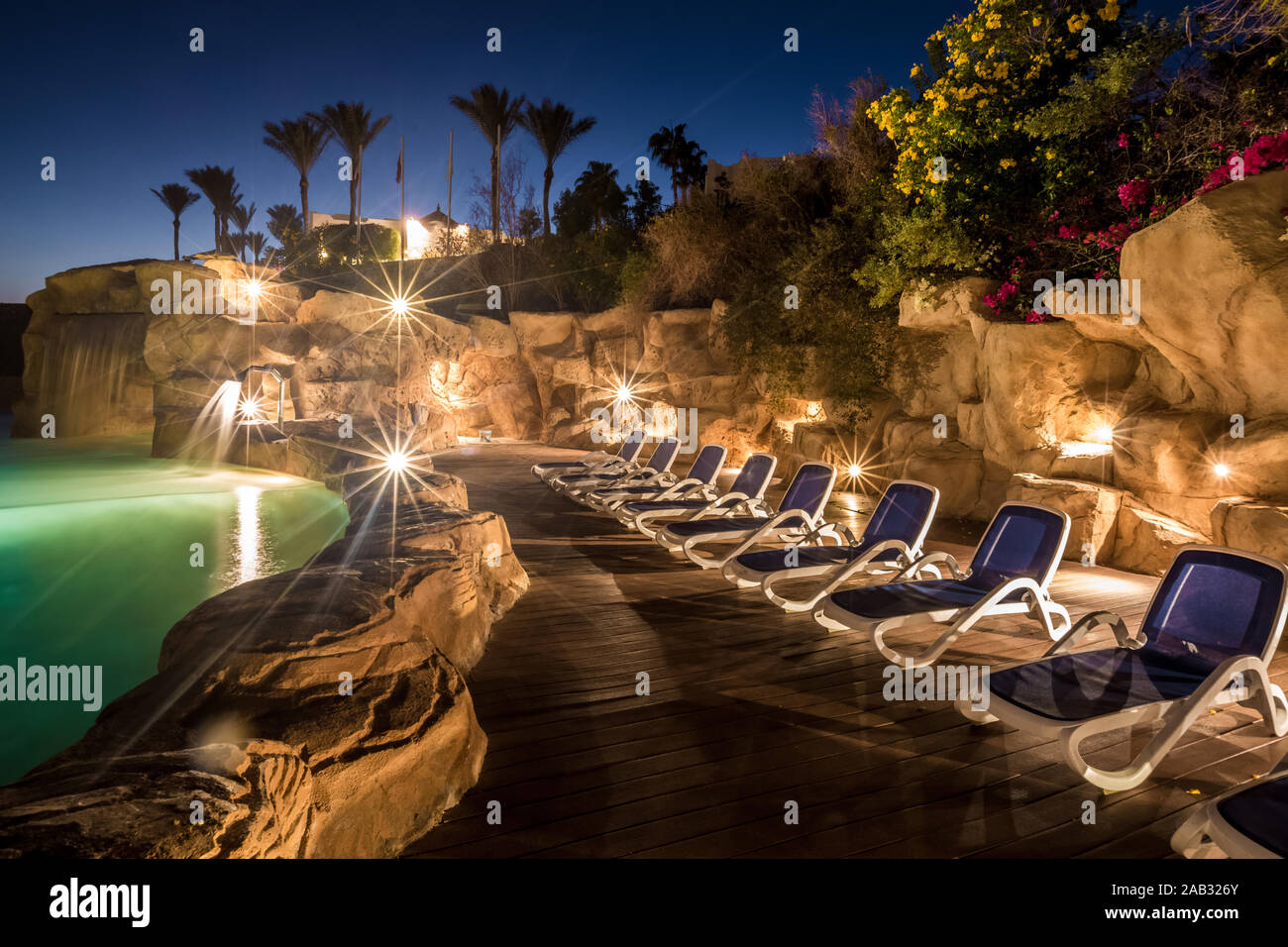 Evening view for luxury swimming pool in night illumination Stock Photo ...