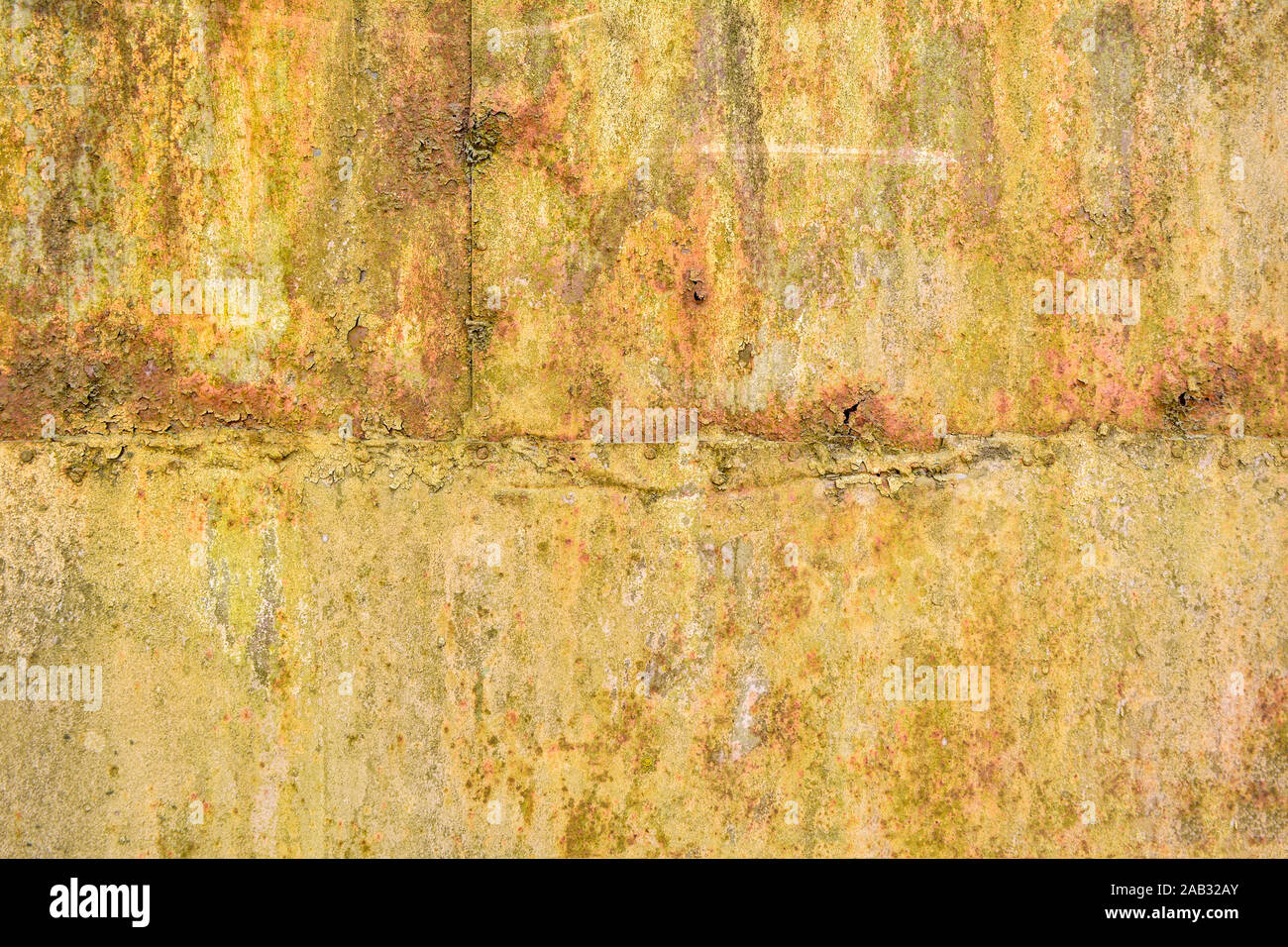 Detail of broken rusty corroded metal wall. Old orange metal texture ...